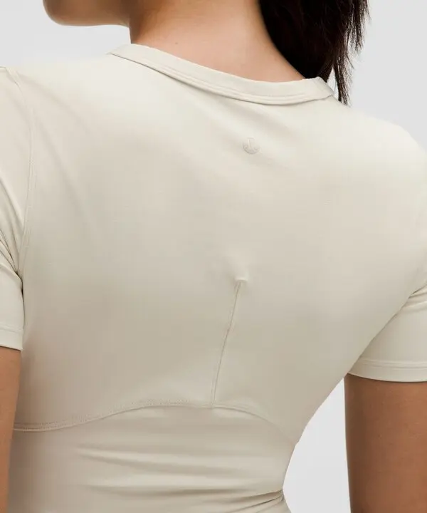 Lululemon Cropped Nulu Twist-hem Short-sleeve Shirt - Bone