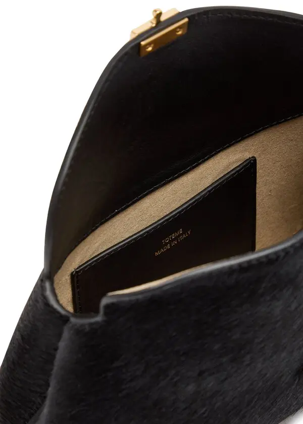TOTEME T-lock Mini Pony Hair Clutch - Black