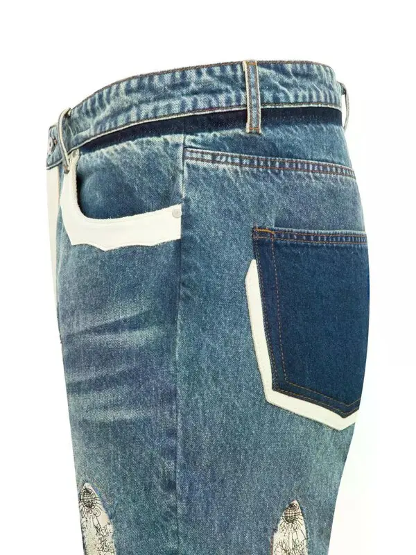WHO DECIDES WAR Appliqué Jeans
