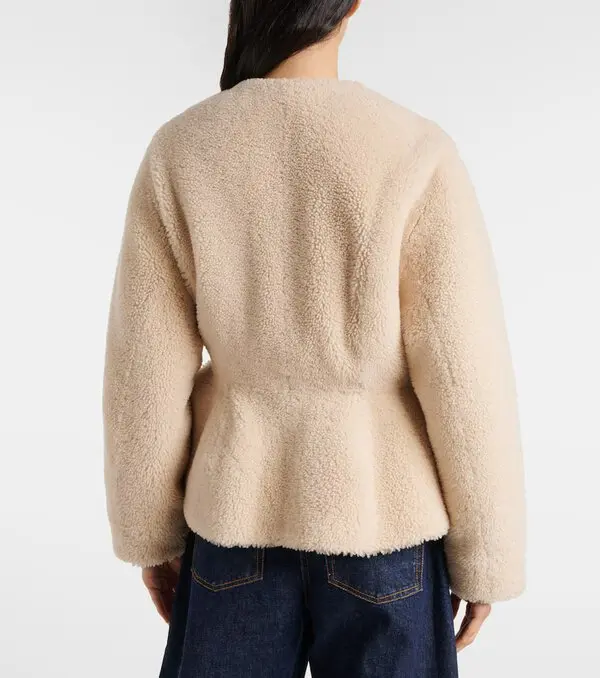 Alaïa Peplum Shearling Jacket - Beige