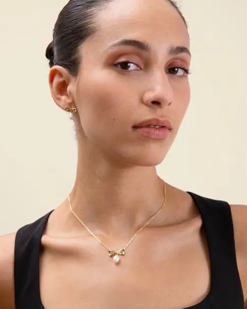 EDGE OF EMBER Bow Pendant Necklace