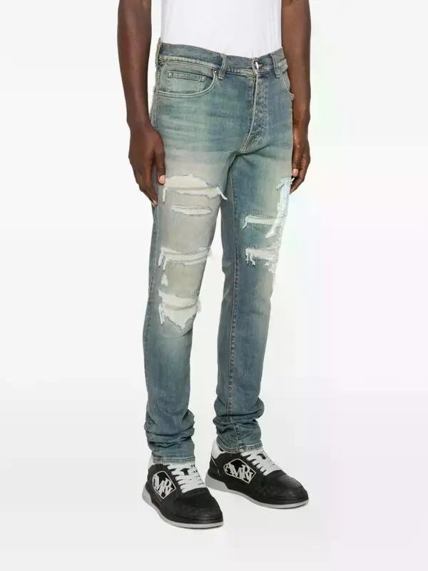 Amiri Graphic Print Ripped Jeans - Blue