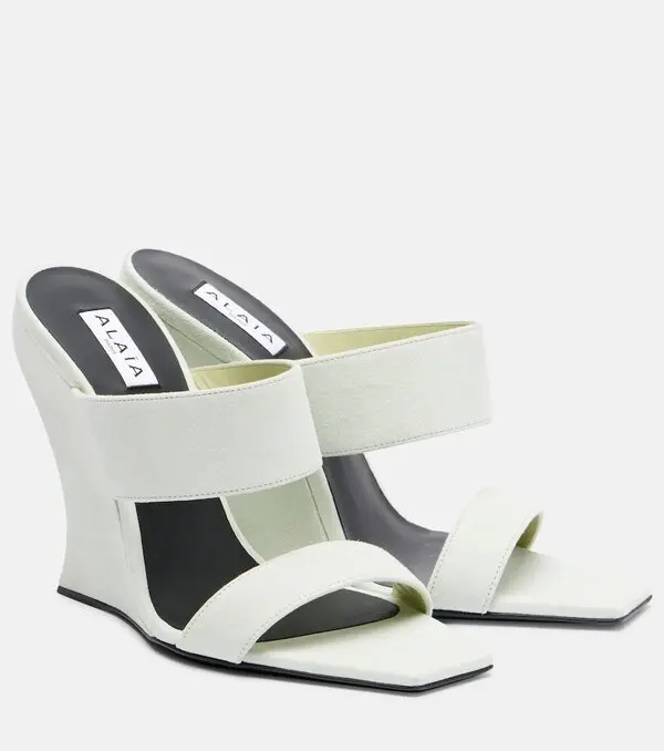 Alaïa 110 Suede Wedge Mules - White