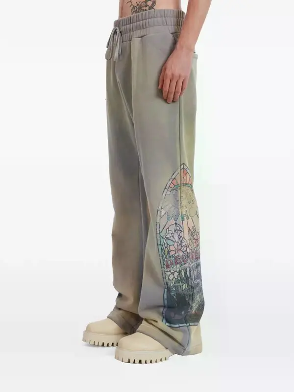 WHO DECIDES WAR Graphic Track Pants - Grey
