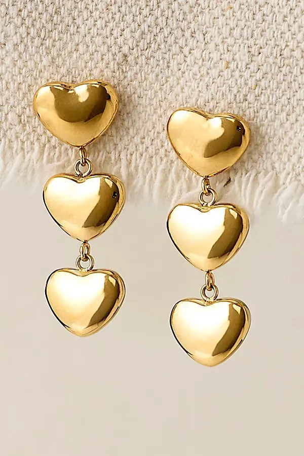 THE CRYSTAL BOUTIQUE Triple Heart Dangle Earrings - Gold