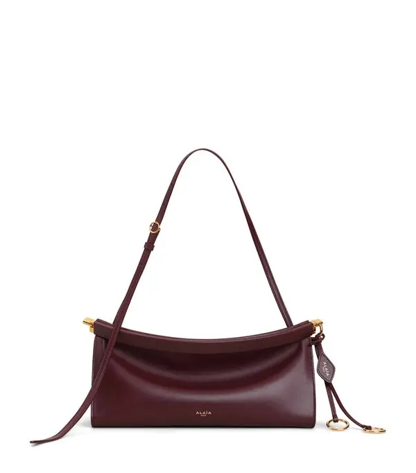 Alaïa Le Click East West Leather Shoulder Bag - Red