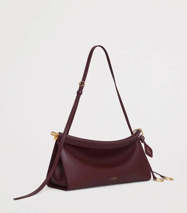 Alaïa Le Click East West Leather Shoulder Bag - Red