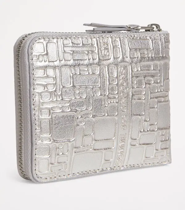 Comme Des Garçons Leather Embossed Logo Zipped Wallet