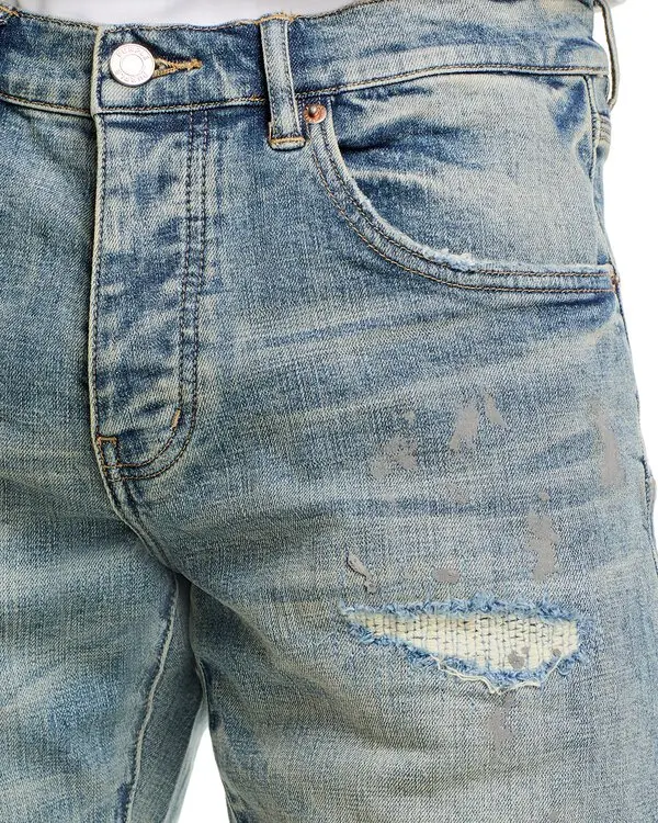 PURPLE BRAND Worn Slashed Paint Jeans - Light Indigo