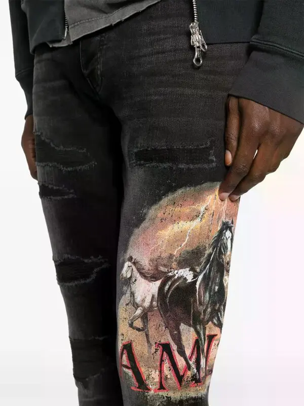 Amiri Ripped Graphic Jeans