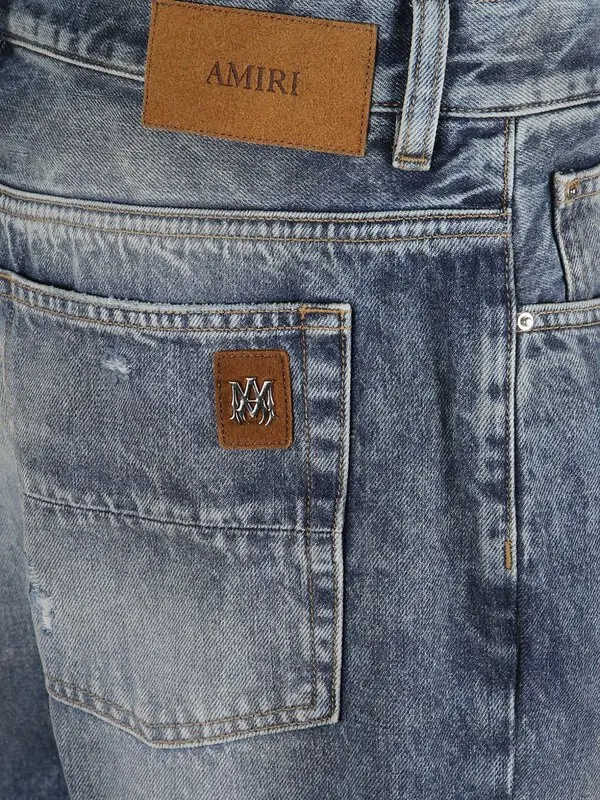 Amiri Slashed Boot-cut Jeans - Blue