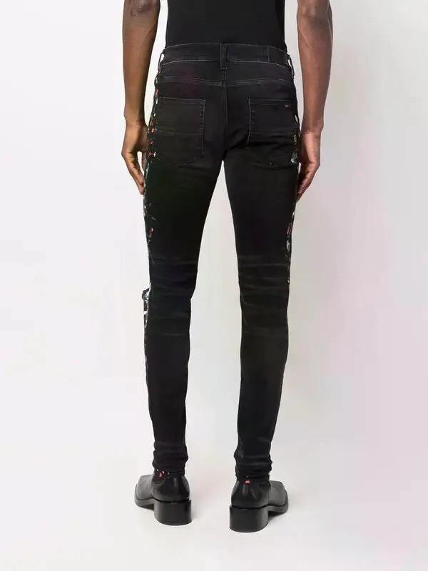 Amiri Paint Splatter Distressed Skinny Jeans