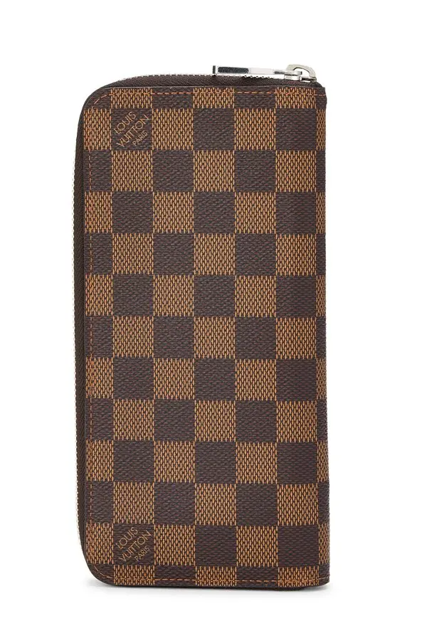 LOUIS VUITTON Damier Ebene Zippy Vertical Wallet - Brown