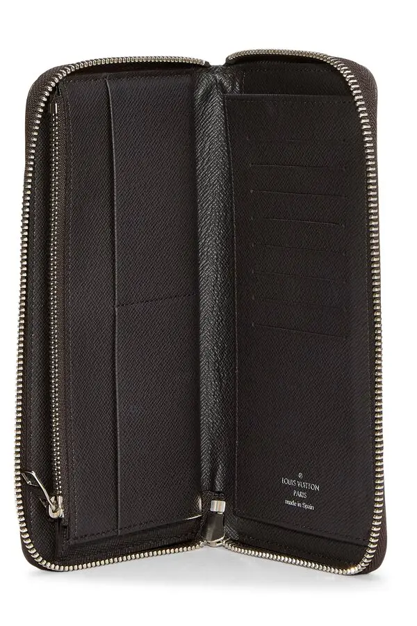 LOUIS VUITTON Damier Ebene Zippy Vertical Wallet - Brown