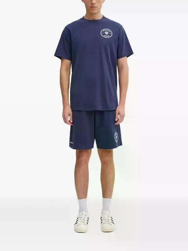 SPORTY & RICH Logo Graphic Shorts