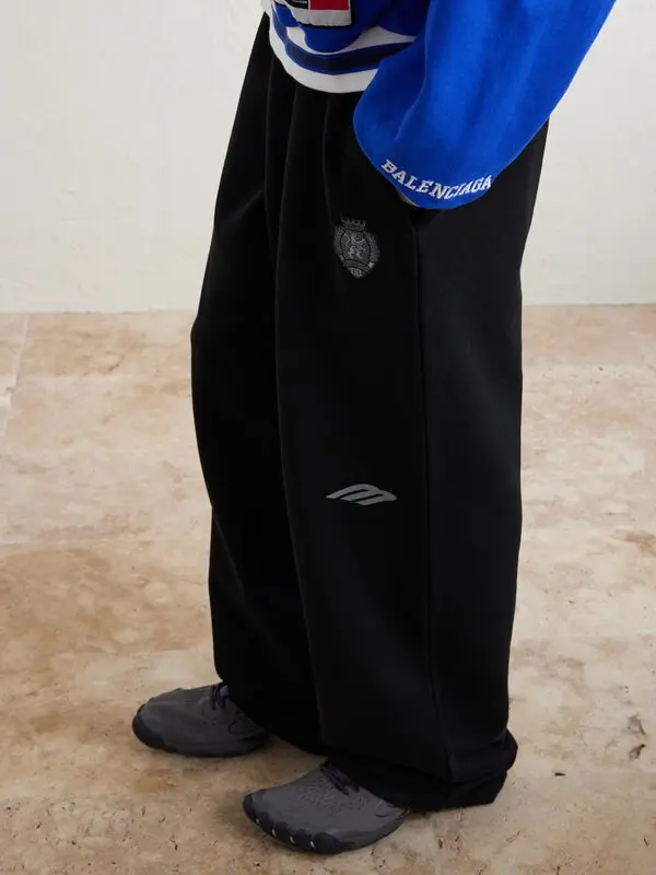 Balenciaga Wide-leg Logo-print Appliquéd Cotton-jersey Sweatpants - Black