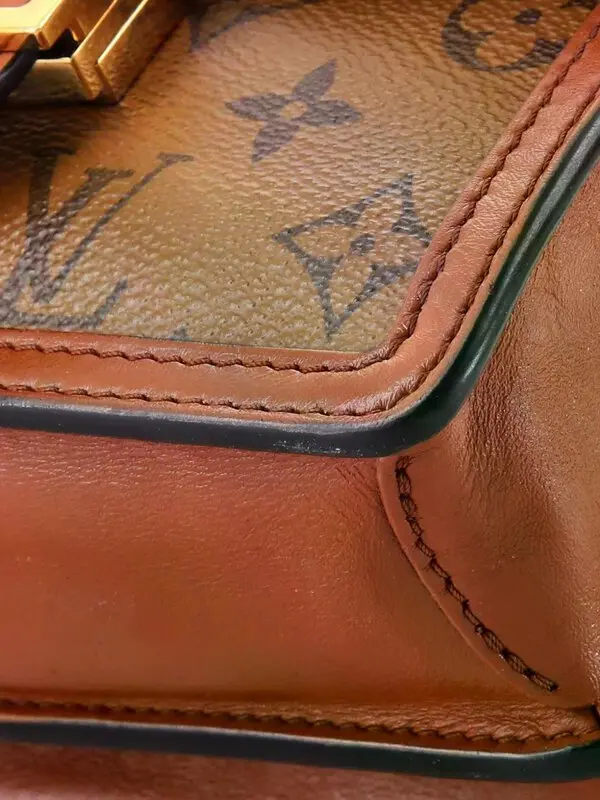 LOUIS VUITTON Dauphine Reverse Monogram Canvas Mini Crossbody Bag - Brown