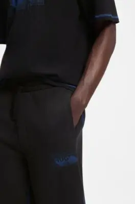 Hugo Logo-artwork Tracksuit Bottoms In Cotton Terry