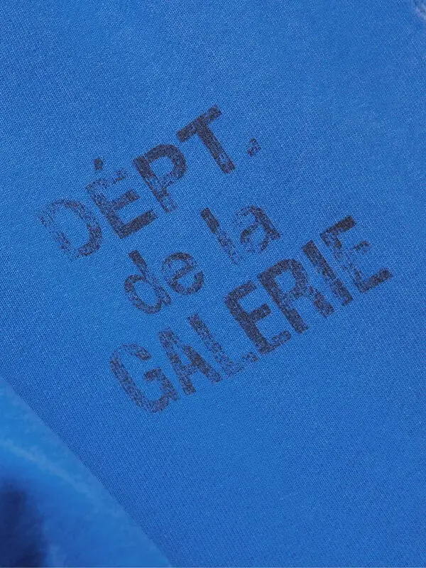 GALLERY DEPT. Flared Denim-panelled Logo-print Cotton-jersey Sweatpants - Blue