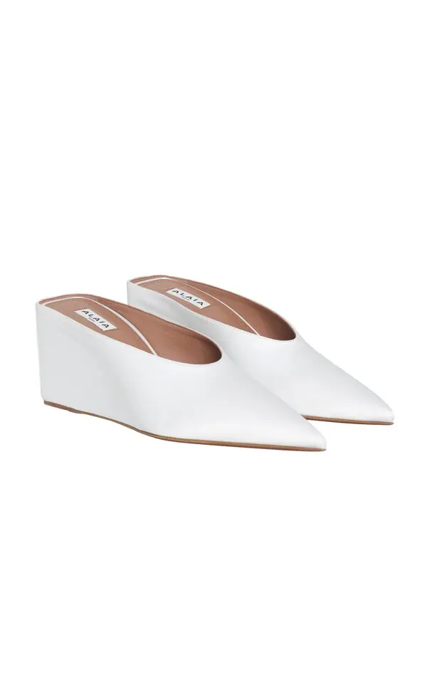 Alaïa Satin Wedge Mules - White