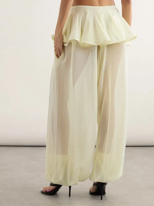 Alaïa Pleated Georgette Peplum Tapered Pants - Yellow