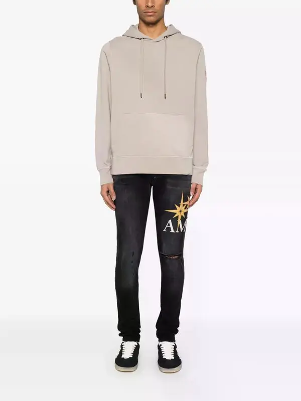 Amiri Starburst Appliqué Jeans