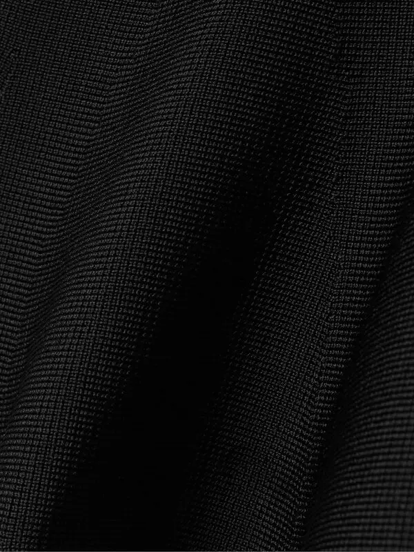 Khaite Andra Stretch-knit Peplum Top - Black