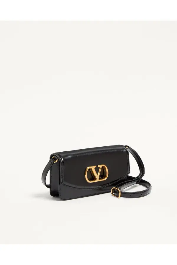 Valentino Garavani Vain Clutch Bag In Shiny Calfskin - Black