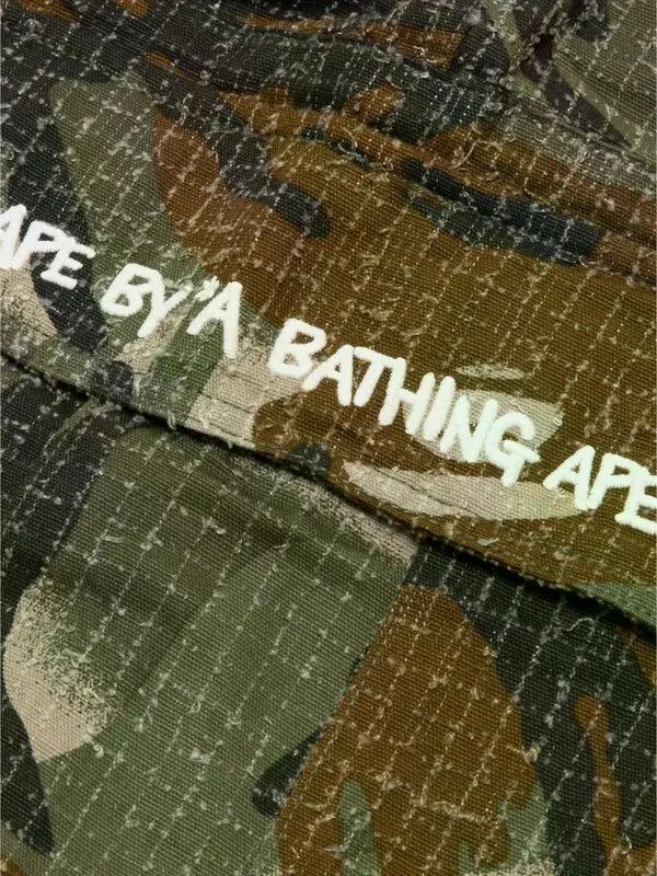 AAPE BY *A BATHING APE® Camouflage Print Trousers