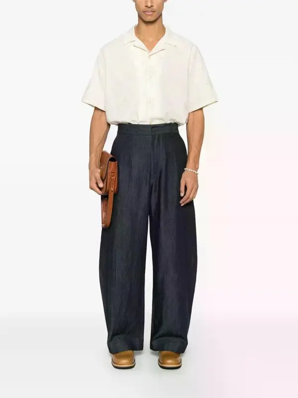 Studio Nicholson Curved-leg Trousers