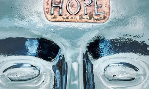 KOSTA BODA Companion Hope Glass Mask Sculpture