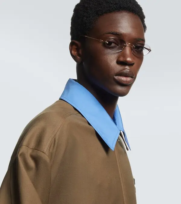 Miu Miu Oval Sunglasses - Gold