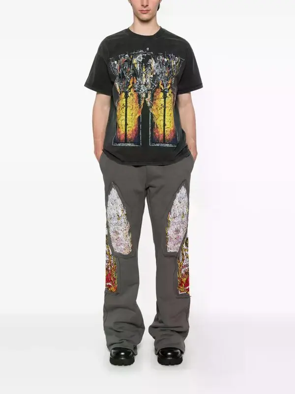 WHO DECIDES WAR BY EV BRAVADO Triple Flame Glass Trousers