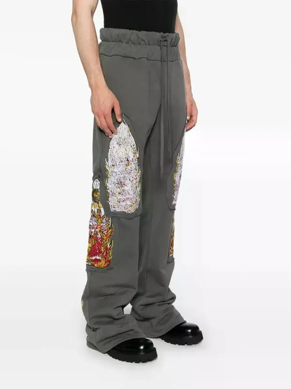 WHO DECIDES WAR BY EV BRAVADO Triple Flame Glass Trousers