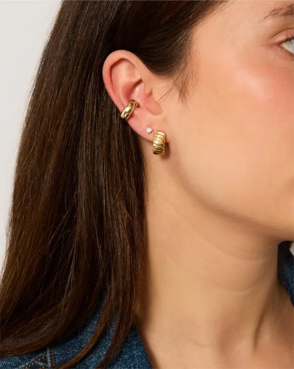 Ring Concierge Wavy Huggie Earrings