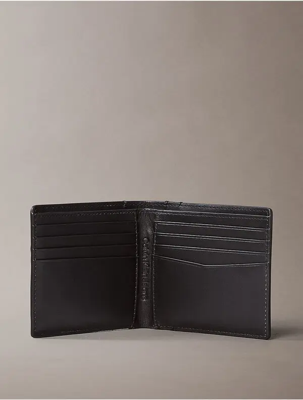 Calvin Klein Embossed Monogram Bifold Wallet