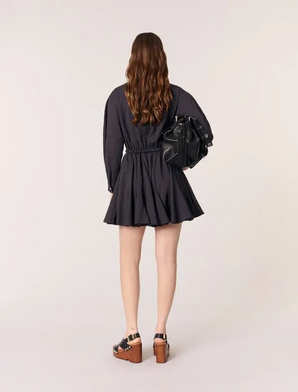 Maje Mini Crepe Dress With Belted Waist And Pleated Skirt