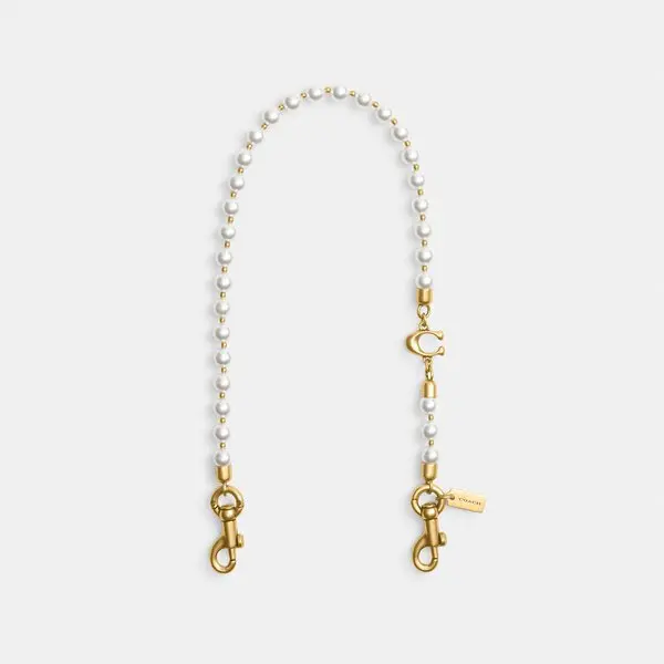 COACH Pearl Strap With Signature Charm - Brass/chalk