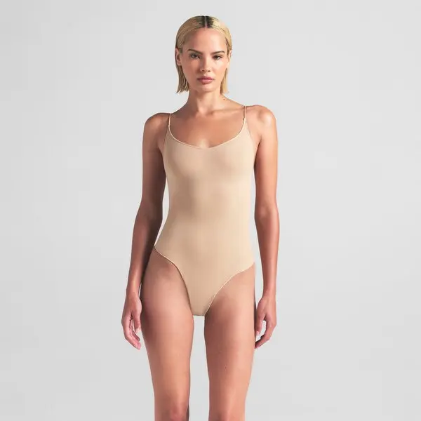 SKIMS Sheer Seamless Thong Bodysuit - Sand