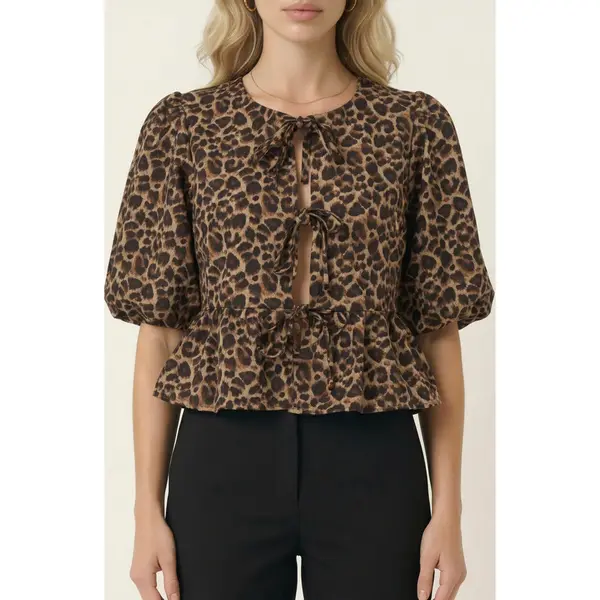 MODENAIRE Peplum Top With Tie Closures And Puff Sleeves