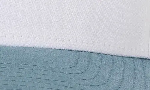 Travis Mathew Base Fare Trucker Cap