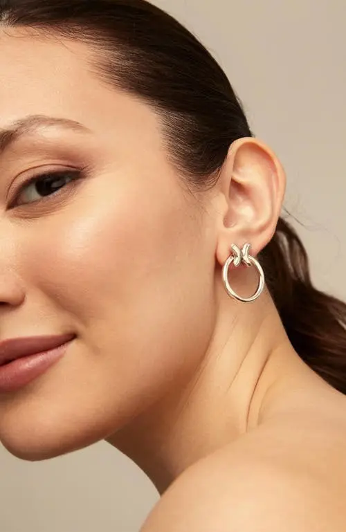 UNODE50 Butterfly Swing Sterling -plated Hoop Earrings - Silver