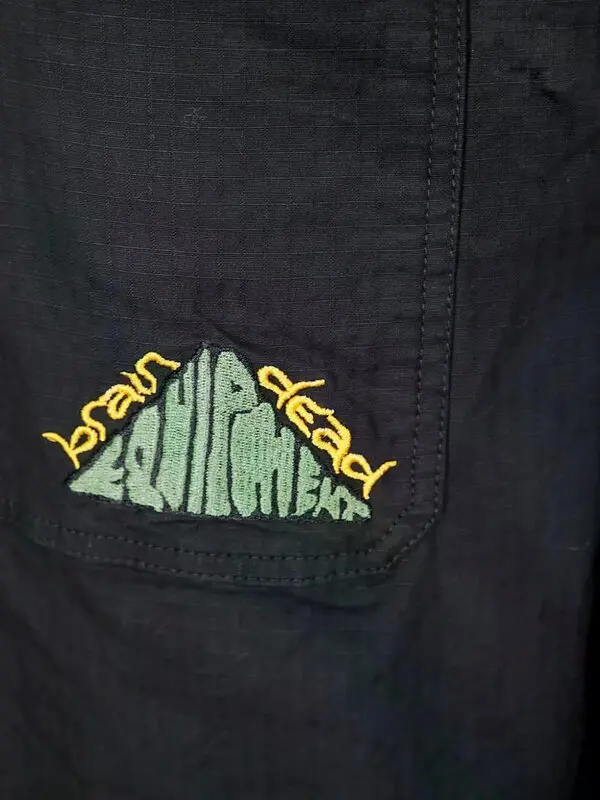 BRAIN DEAD Embroidered-pocket Trousers