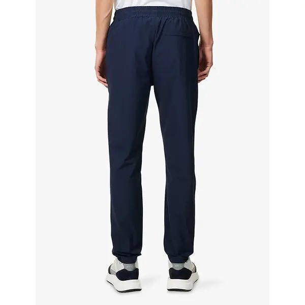 ARNE Active Technical Tapered-leg Stretch-woven Trousers - Navy
