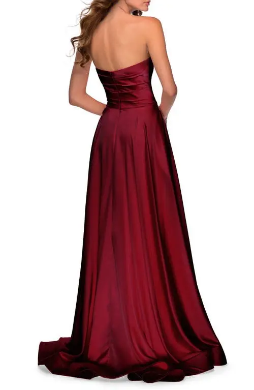 La Femme Strapless Satin Gown With Pleated Bodice And Slit - Wine