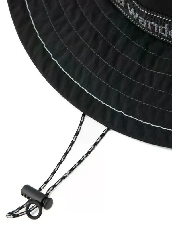 AND WANDER Jq Tape Bucket Hat