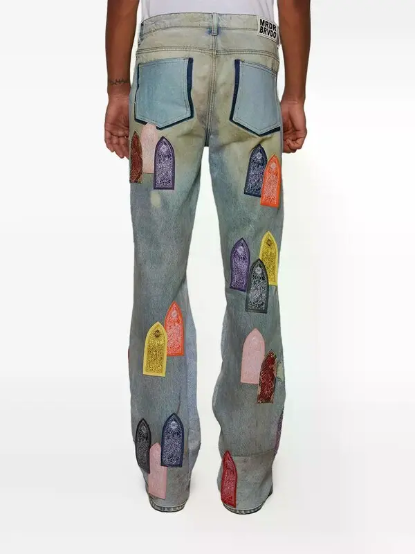 WHO DECIDES WAR Patch Arched Repaired Jeans
