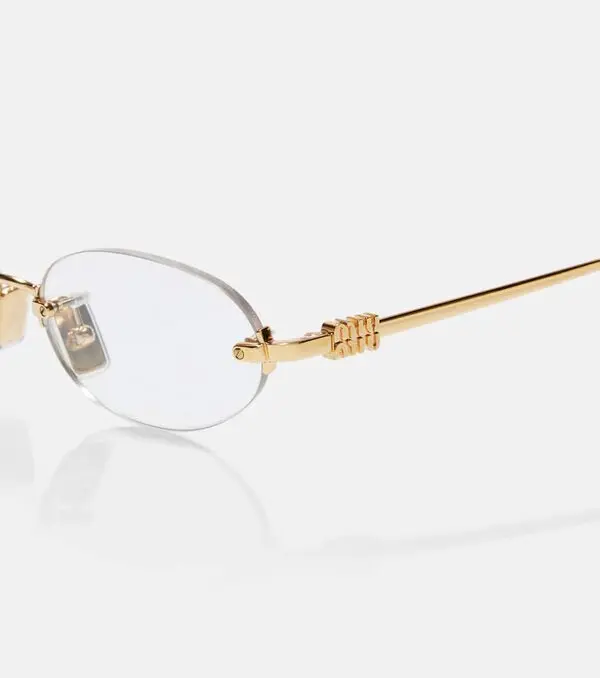 Miu Miu Oval Eyeglasses