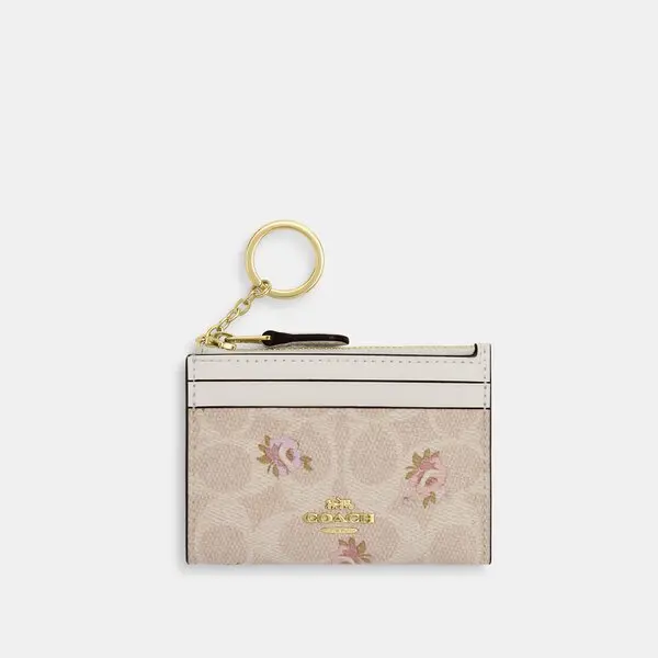 COACH OUTLET Coach Mini Skinny Id Case In Signature Canvas With Floral Print