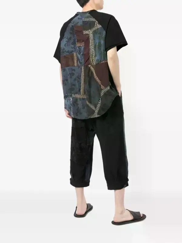 By Walid Raglan-sleeved T-shirt